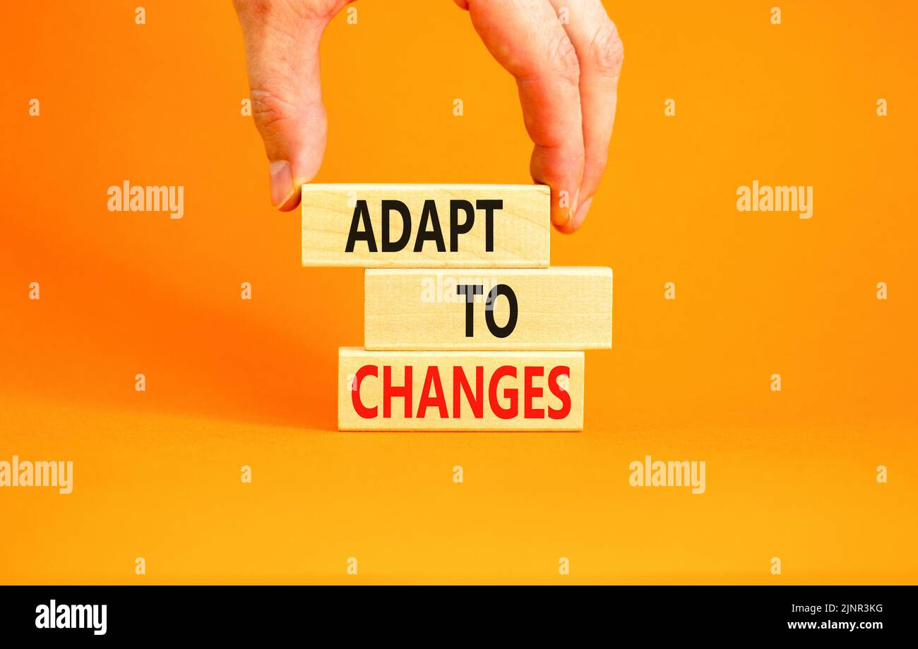 Adapt to changes symbol. Concept words Adapt to changes on wooden ...