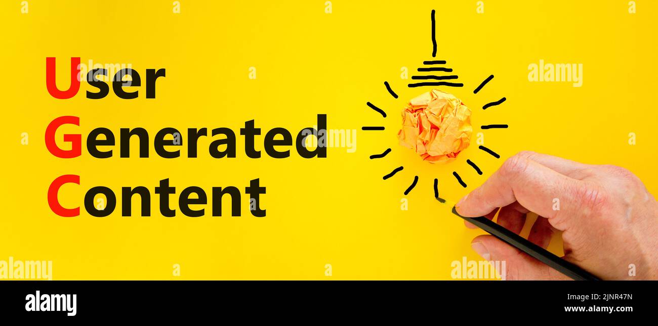 UGC user generated content symbol. Concept words UGC user generated content on a beautiful ...