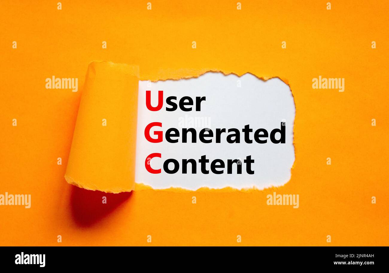 UGC user generated content symbol. Concept words UGC user generated content on white paper on a ...