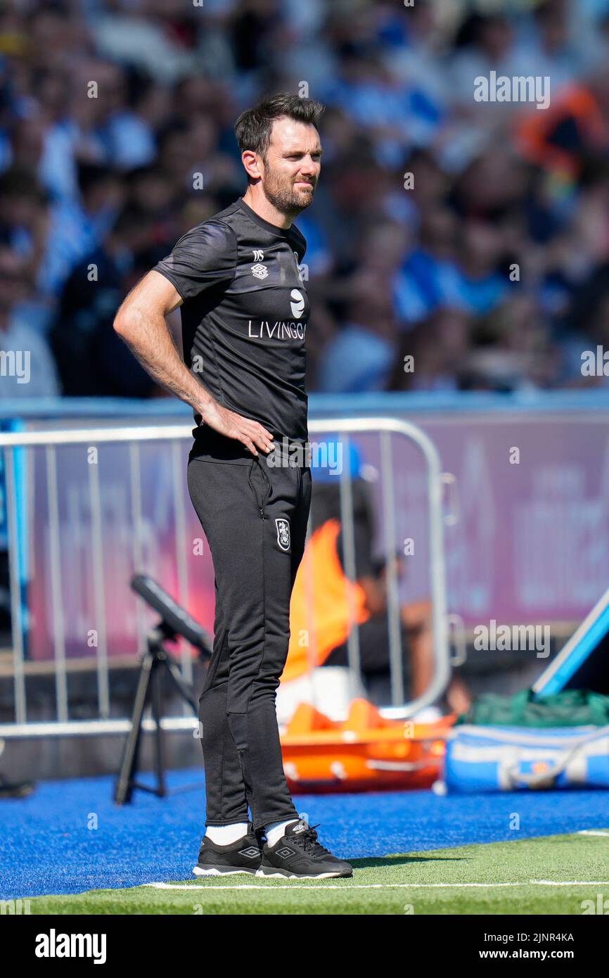 Danny Schofield manager of Huddersfield Town watches the game Stock ... Danny Schofield manager of Huddersfield Town watches the game Stock ...