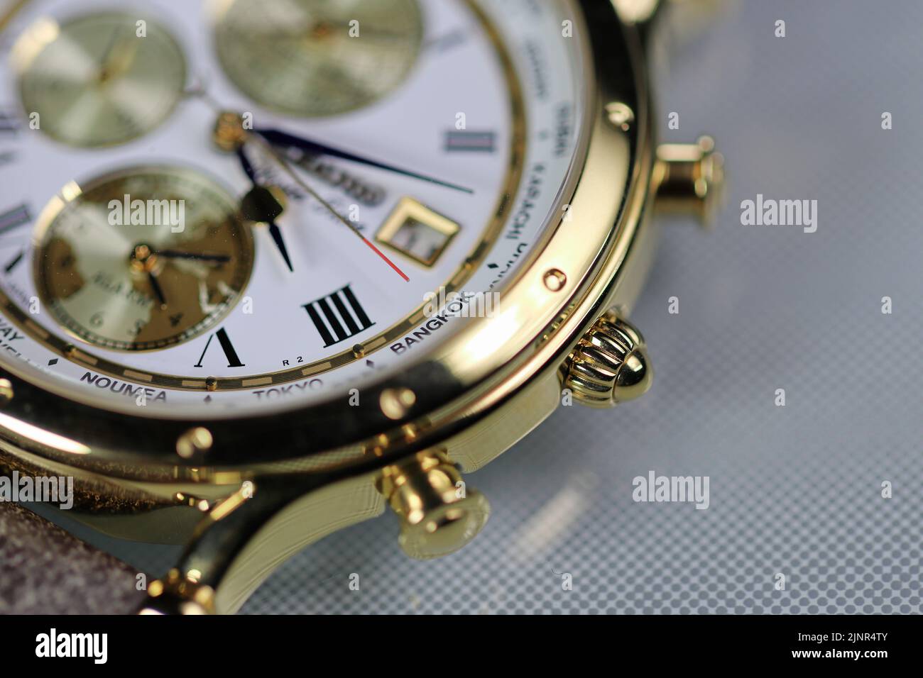 closeup crown of luxury world time men watch Stock Photo - Alamy