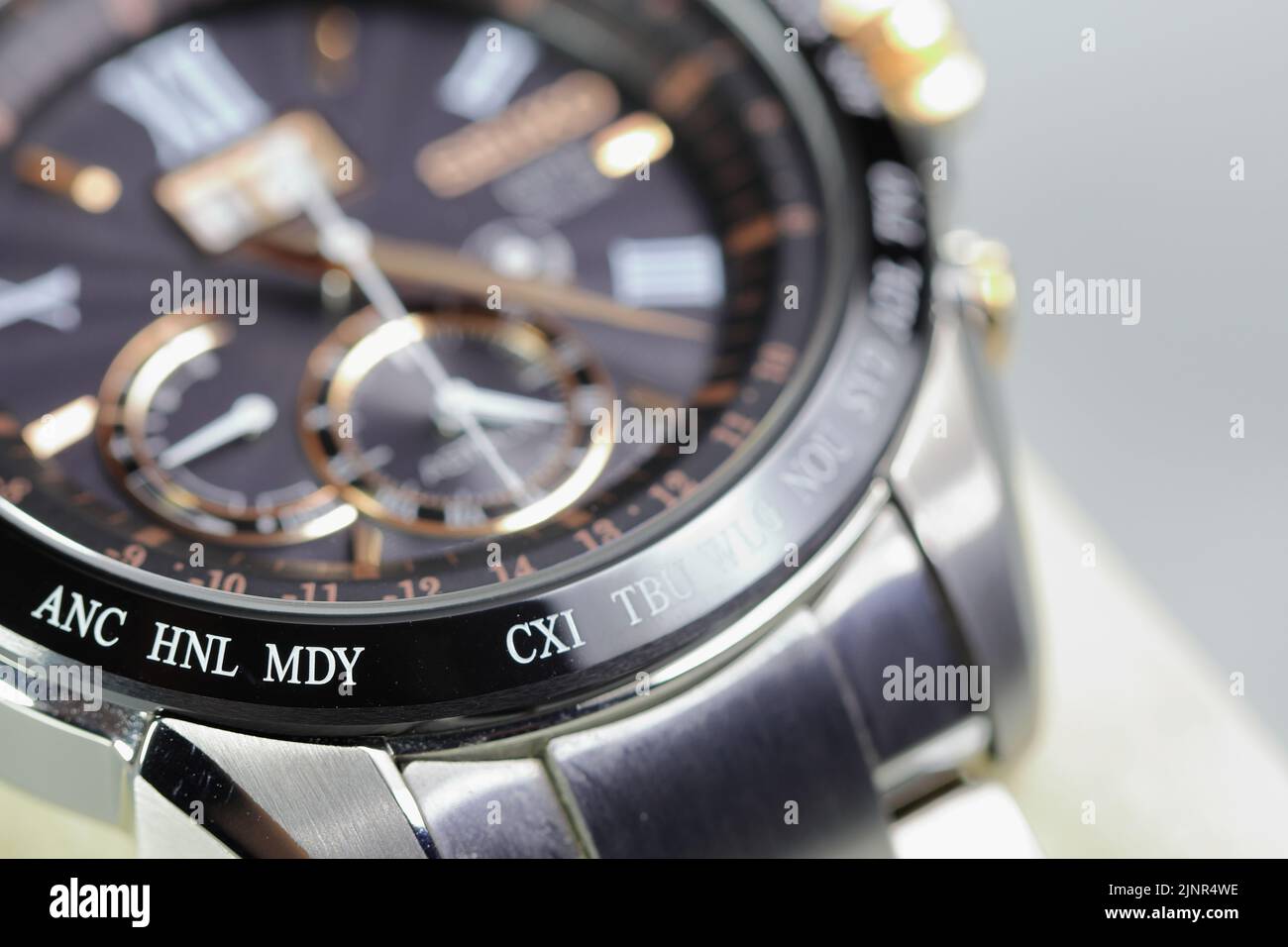 close up shallow focus Time zone cities code on luxury world time watch ...