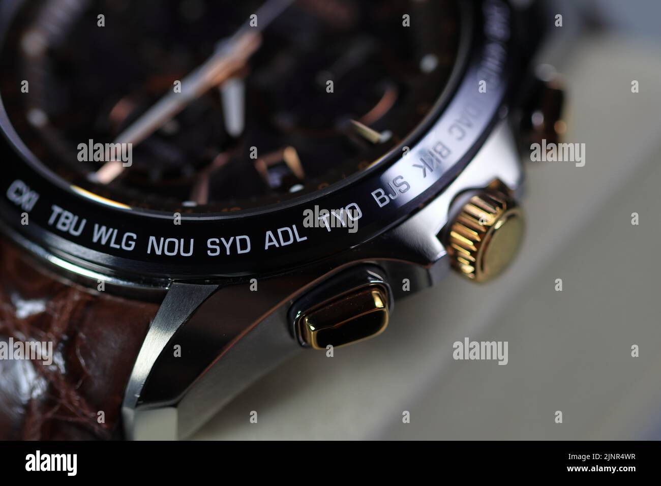 close up shallow focus Time zone cities code on luxury world time watch ...