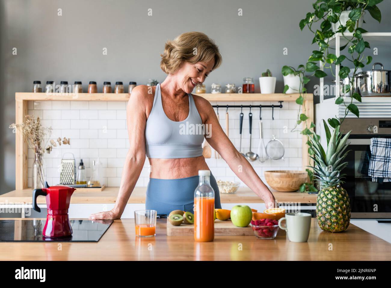 Beautiful mature senior woman at home, domestic life and leisure ...