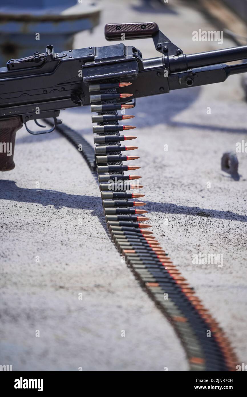 Close up shot of a machine gun belt loaded with cartridges Stock Photo ...