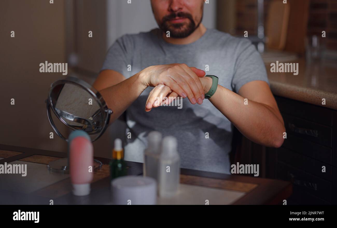 Men's beauty concept. caucAsian guy checking his skin. man with beard ...