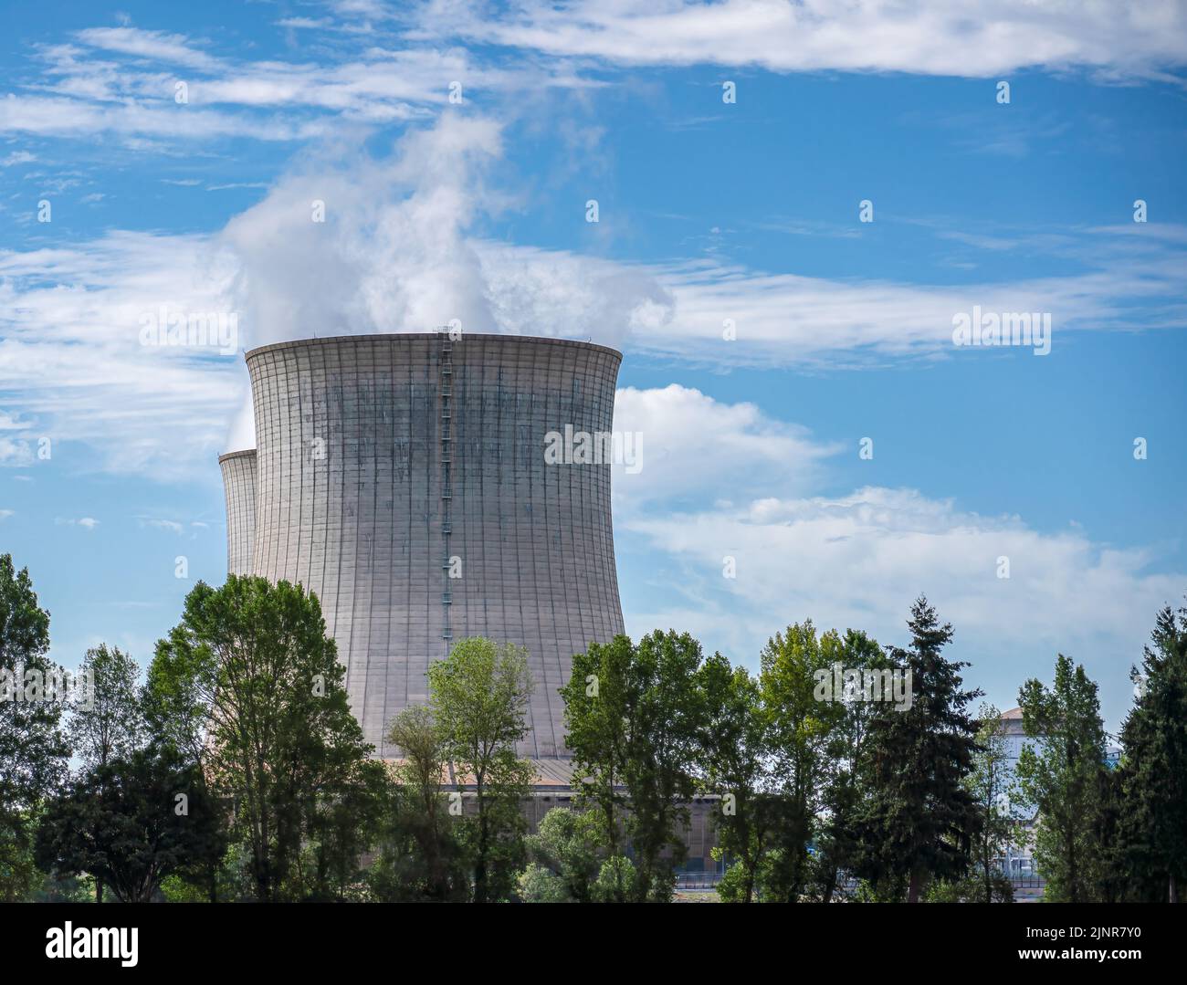 steam rising from cooling towers for a nuclear power plant in the ...