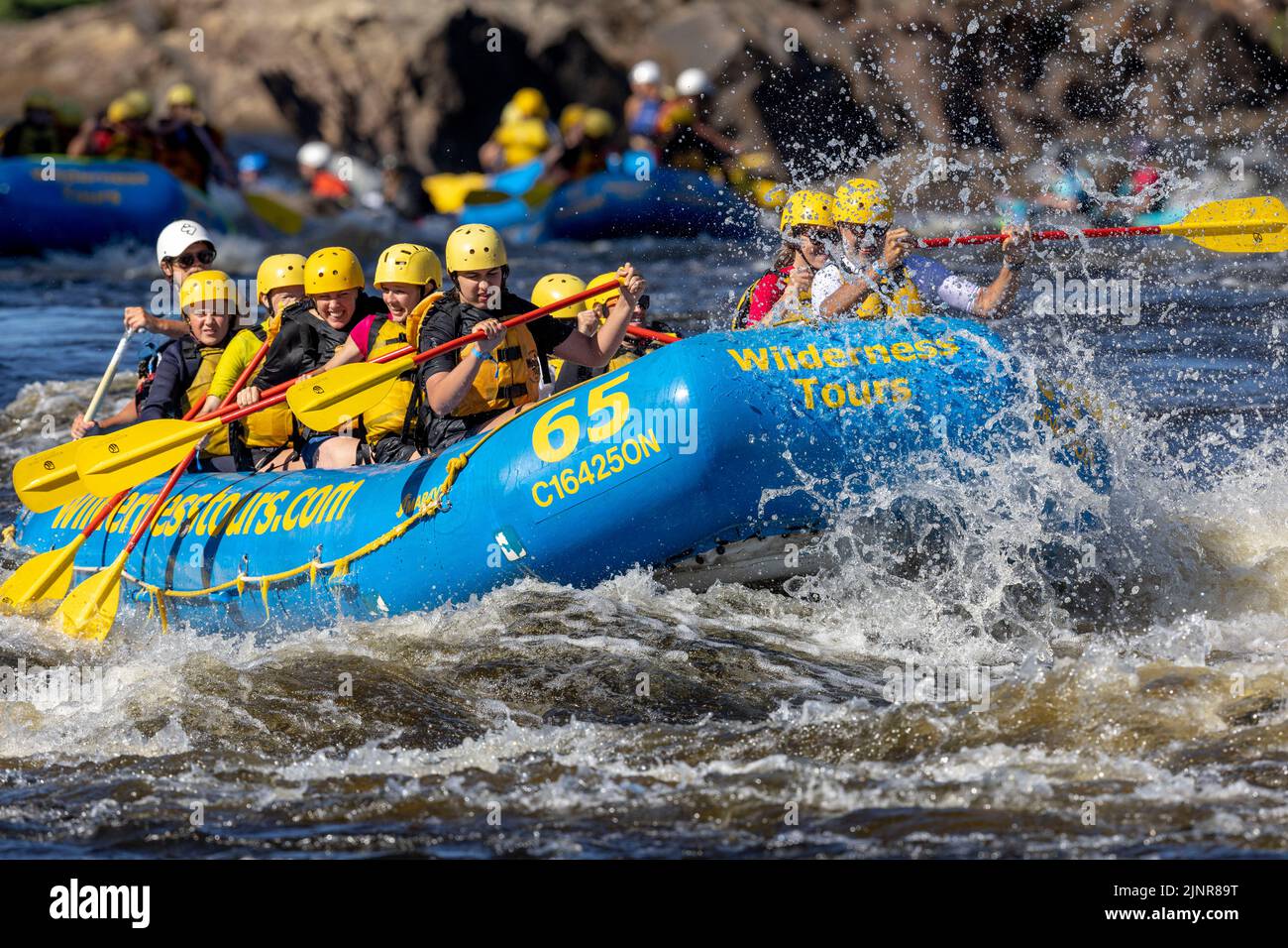 (Ottawa River near Cobden, Canada---12 August 2022) Whitewater rafters ...