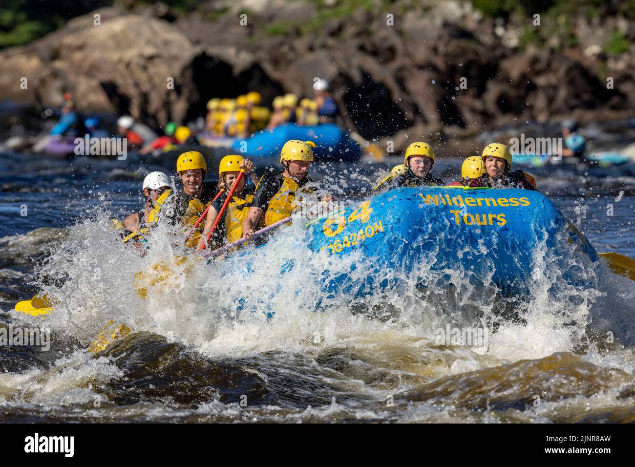 (Ottawa River near Cobden, Canada---12 August 2022) Whitewater rafters ...