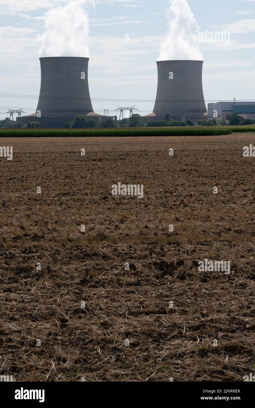 steam rising from cooling towers for a nuclear power plant in the ...
