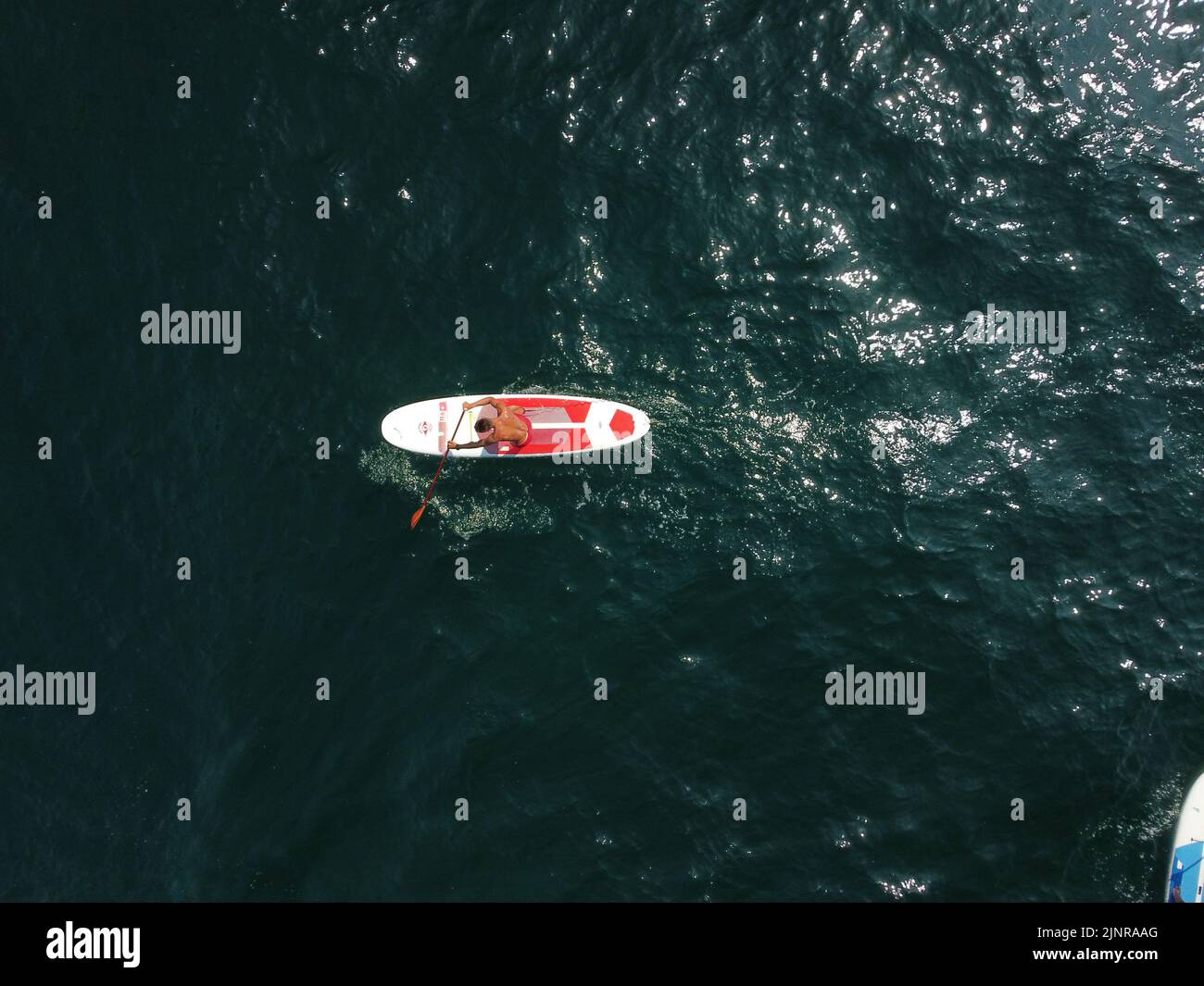 Aerial top down male surfer hi-res stock photography and images - Alamy