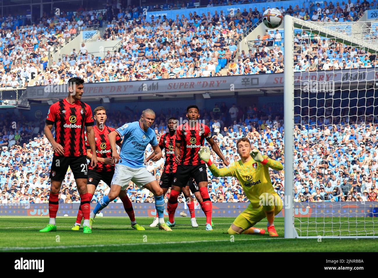 Erling Haaland #9 of Manchester City watches on as the ball hits the ...