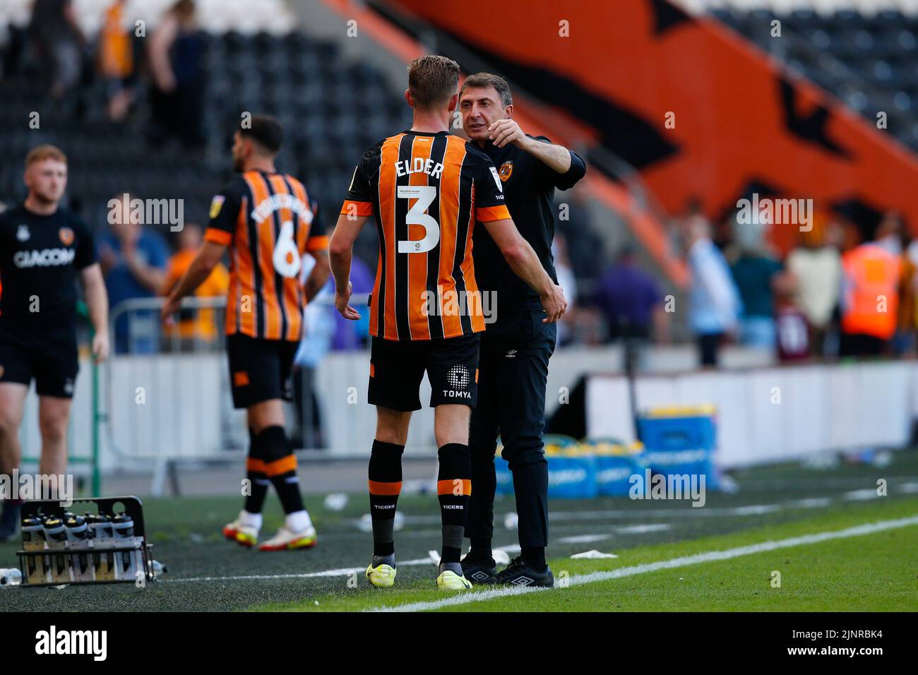 Callum Elder #3 of Hull City and Shota Arveladze manager of Hull City ...