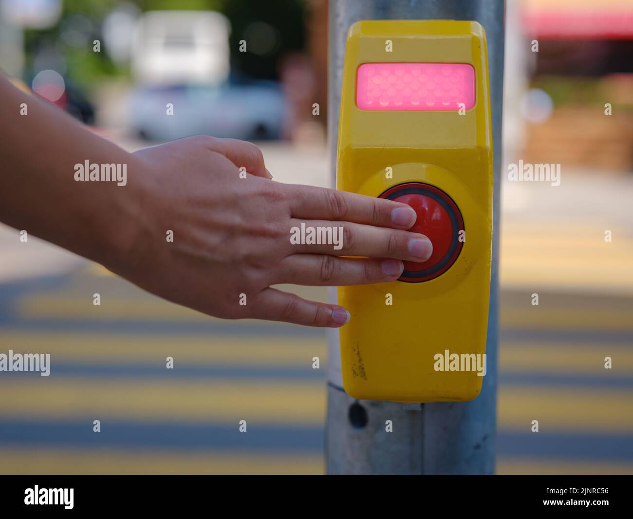 Close-up of a crosswalk signal button taken at a pedestrian controlled ...