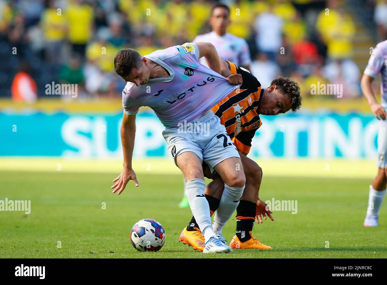 Vaughn Covil #49 of Hull City and KennyÊMcLean #23 of Norwich City ...