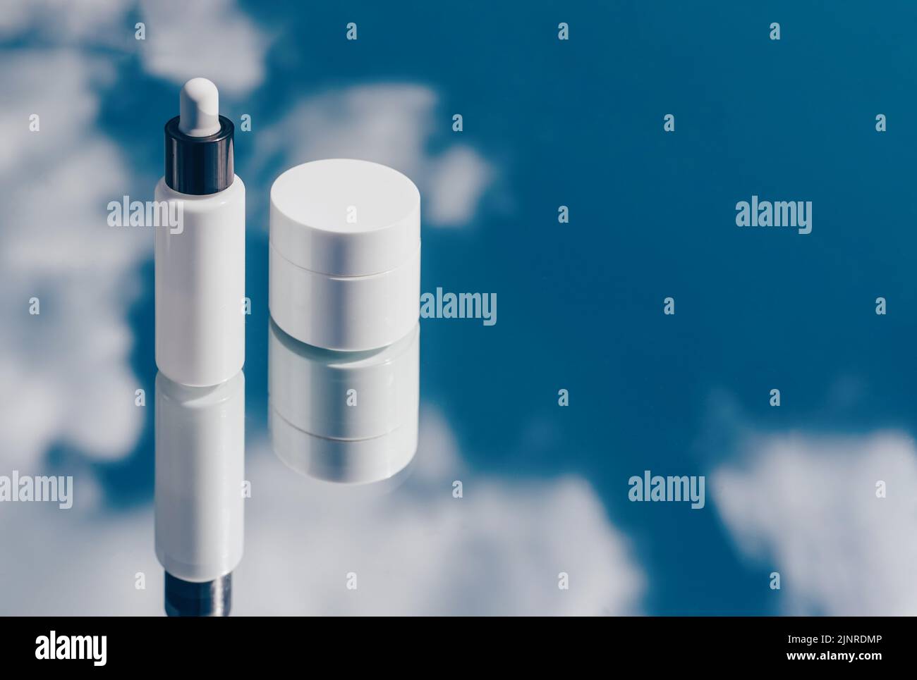 Natural oxygen cosmetics, white mockup of bottle and jar of cream on ...