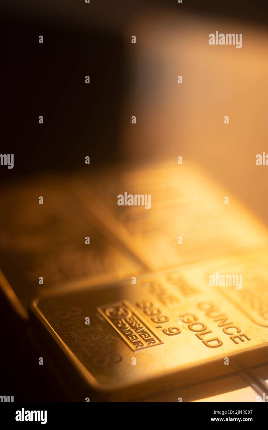 Solid pure 999.9 gold bullion ingot bars photo Stock Photo - Alamy