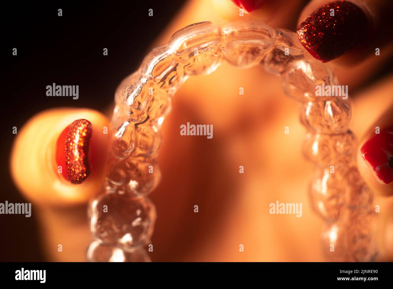 Invisible dental tooth bracket aligners to straighten teeth Stock Photo ...