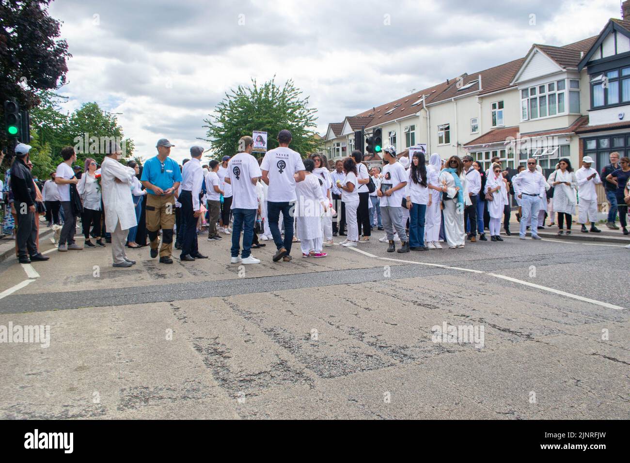 ILFORD, LONDON, ENGLAND- 2nd July 2022: People taking part in a silent ...