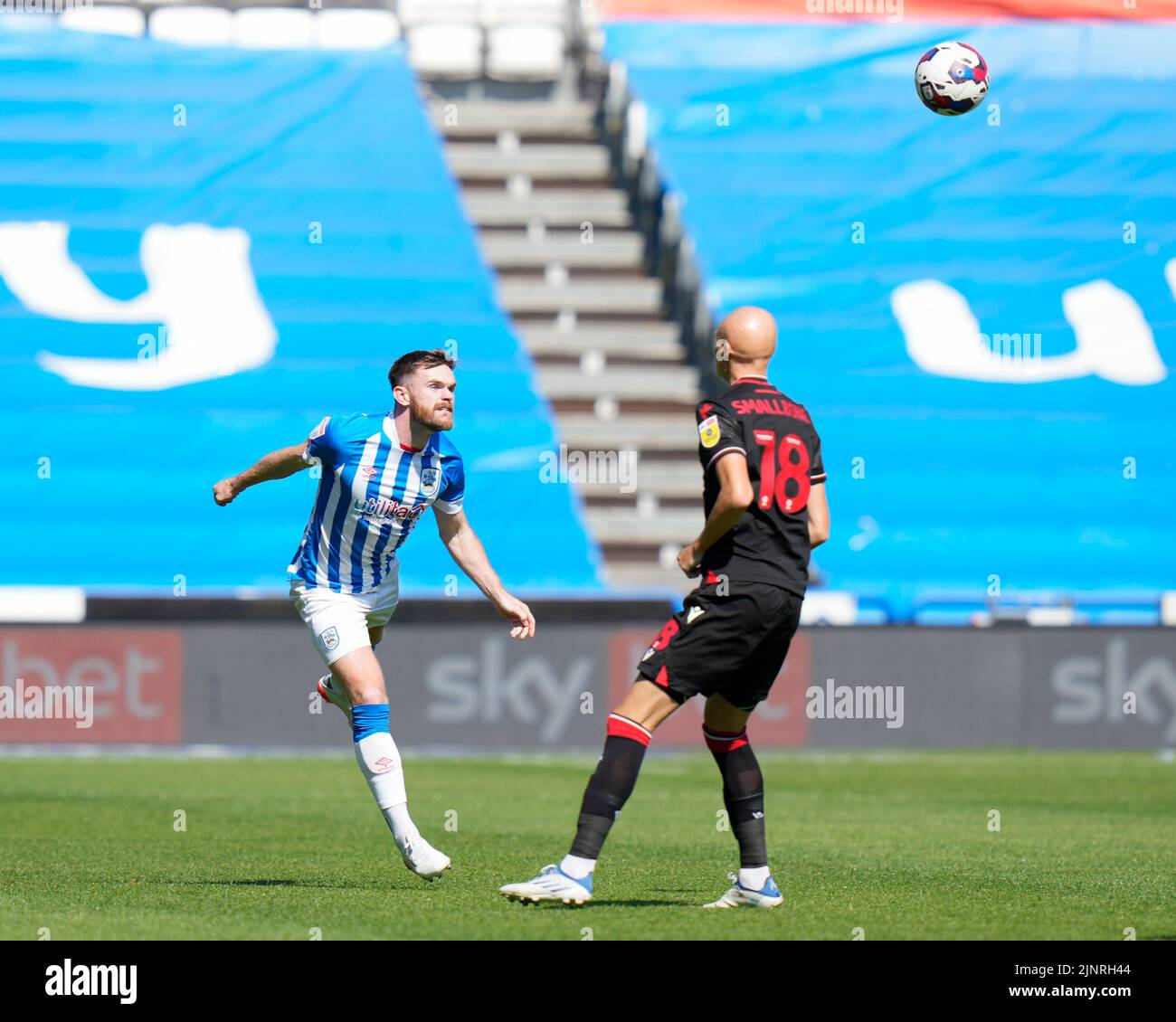 Oliver Turton #2 of Huddersfield Town heads clear Stock Photo - Alamy
