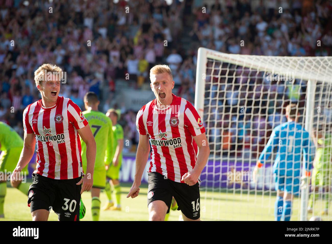 London, UK. 13th Aug, 2022. Ben Mee of Brentford celebrates scoring his ...