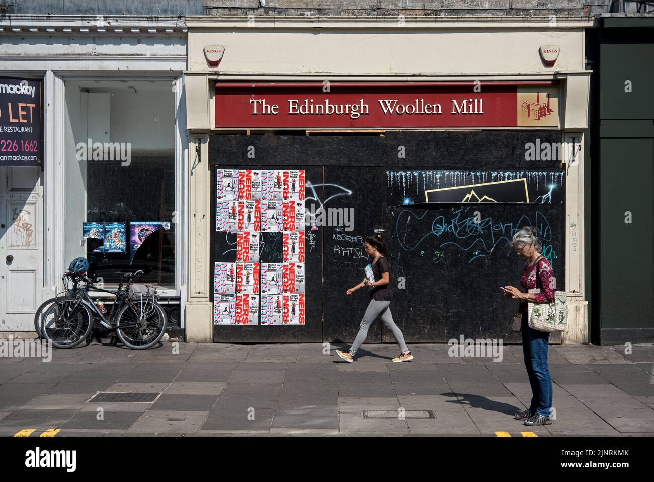 Boarded up branch of The Edinburgh Woollen Mill, Princes Street ...