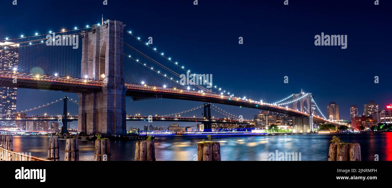 Wide Angle Panorama of the Brooklyn Bridge At Night With Clear Skies ...