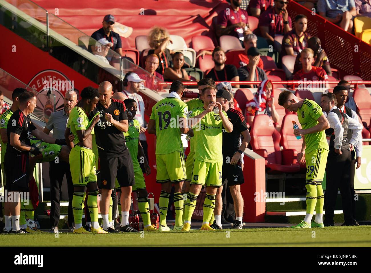 Manchester United players take a drinks break during the Premier League ...