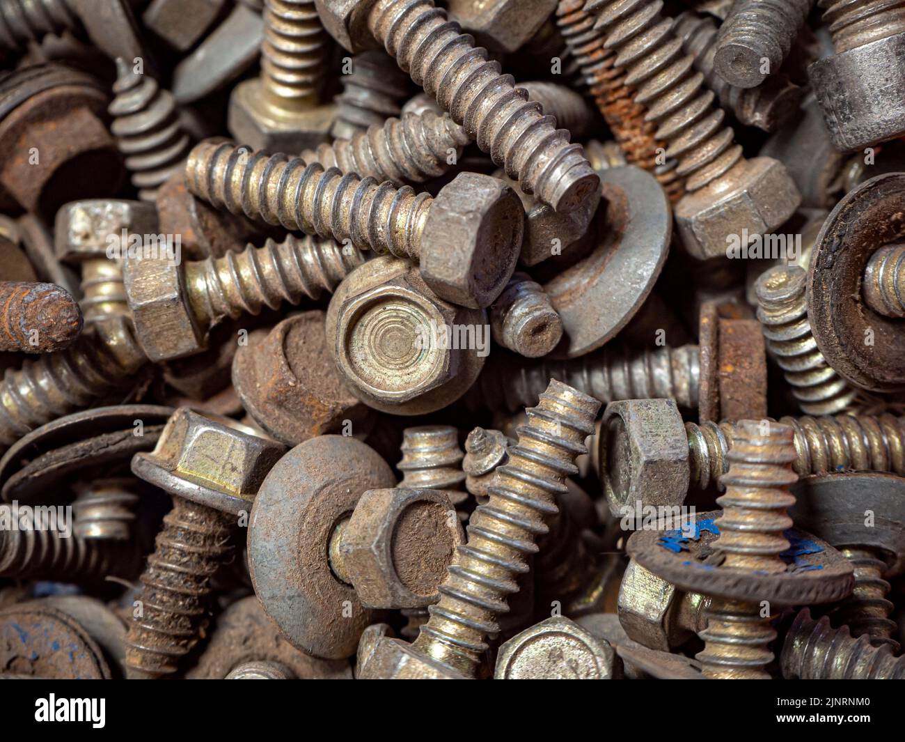 group of rusty screws in a box due to the passage of time Stock Photo ...