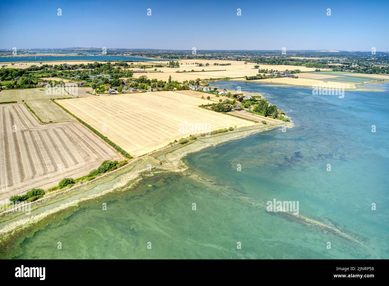Aerial view of the small Parish of Chidham during the hot and dry ...