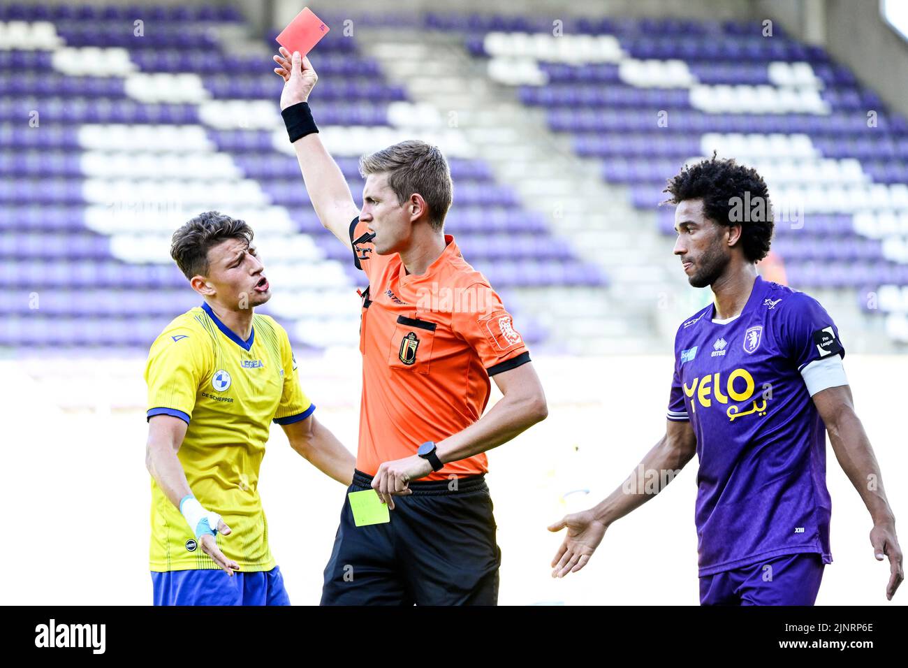 Beveren's Jenthe Mertens receives a red card from referee Arthur Denil ...