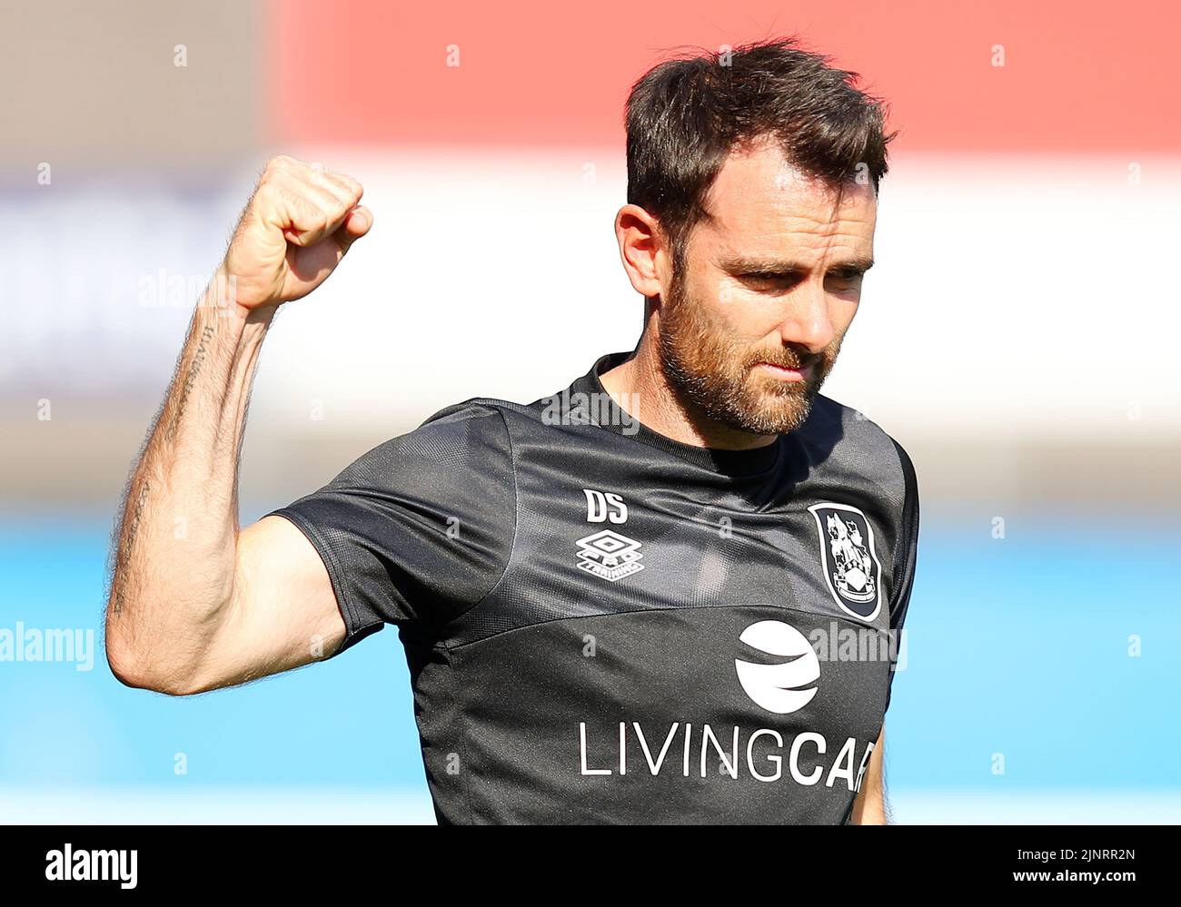 Huddersfield, England, 13th August 2022. Danny Schofield head coach of ...