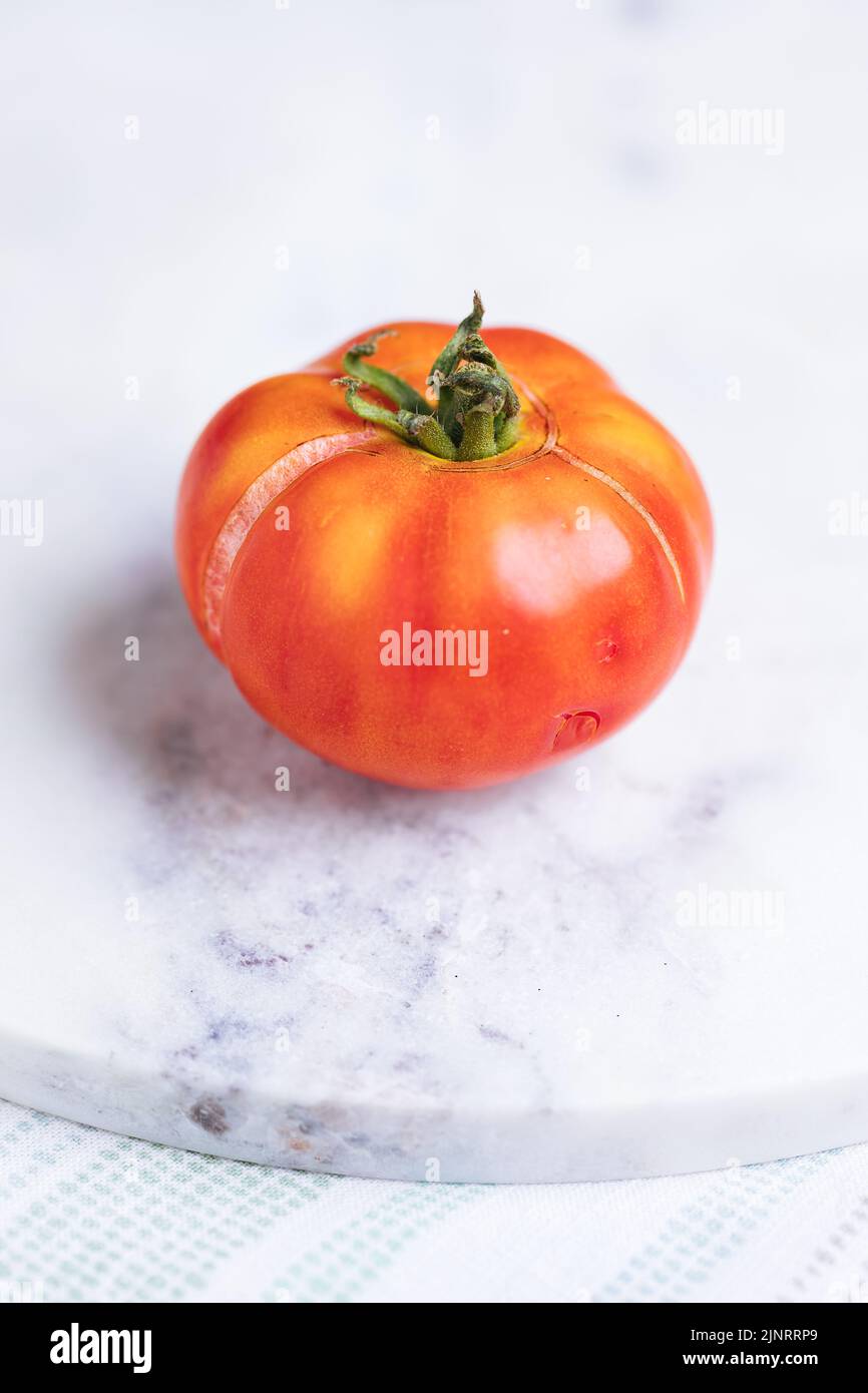 Tomatoes on white marble hi-res stock photography and images - Alamy