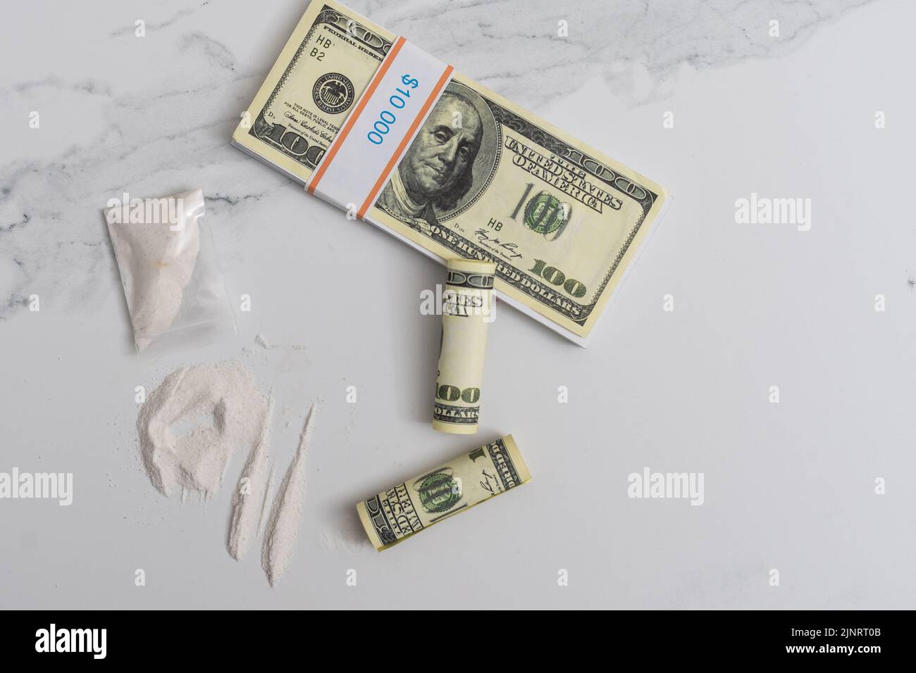 dangerous business - drug laboratory: white powder, syringes and money ...