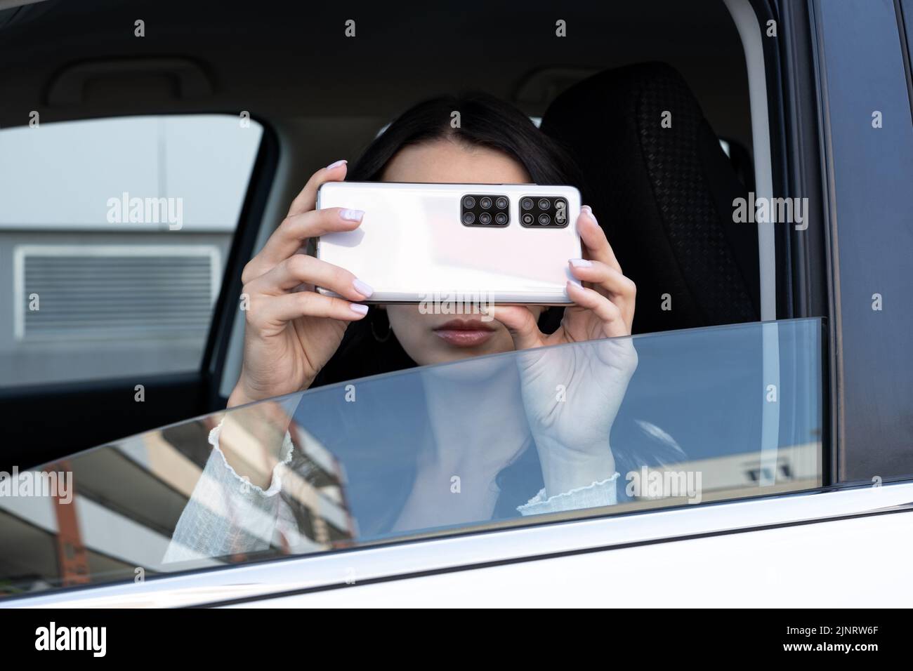 Taking video phone crime hi-res stock photography and images - Alamy