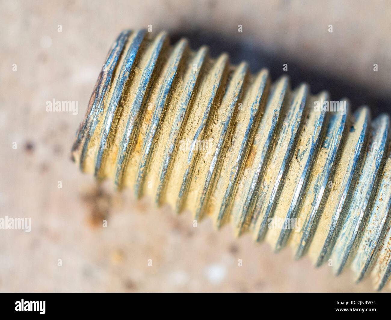galvanized screw with rusty texture on a wooden background Stock Photo ...