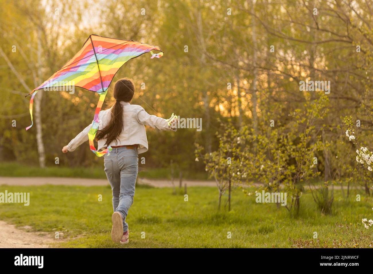 little girl with a kite in the spring. Childhood, Children's Day Stock ...