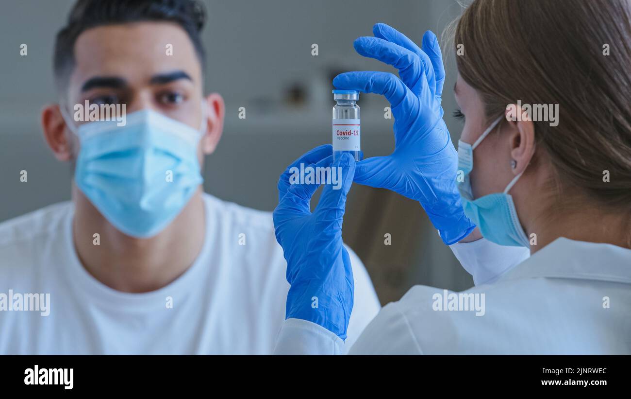 View from behind Caucasian unrecognizable woman doctor wears medical ...