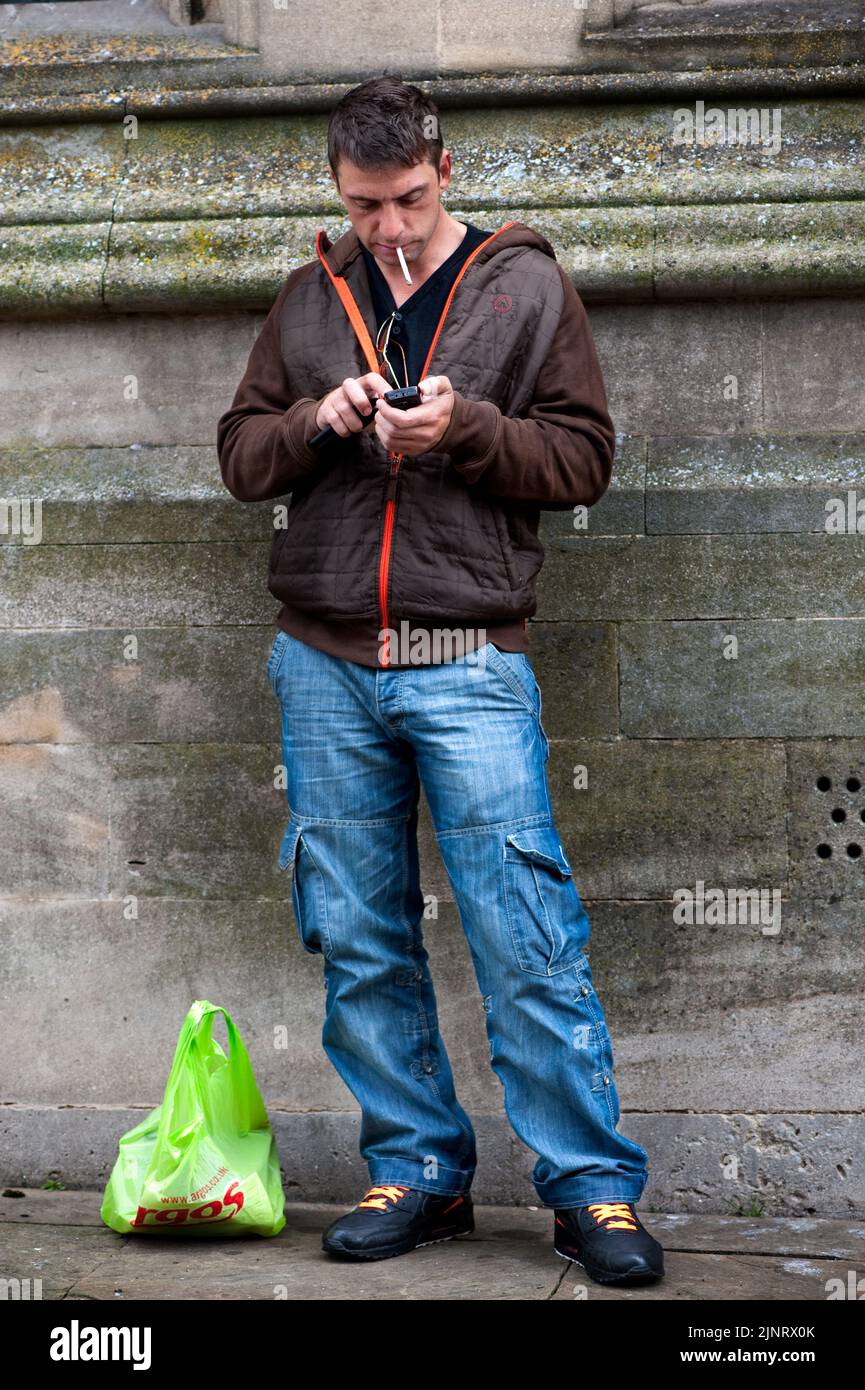 Two kids with a push buggy in Oxford Stock Photo - Alamy