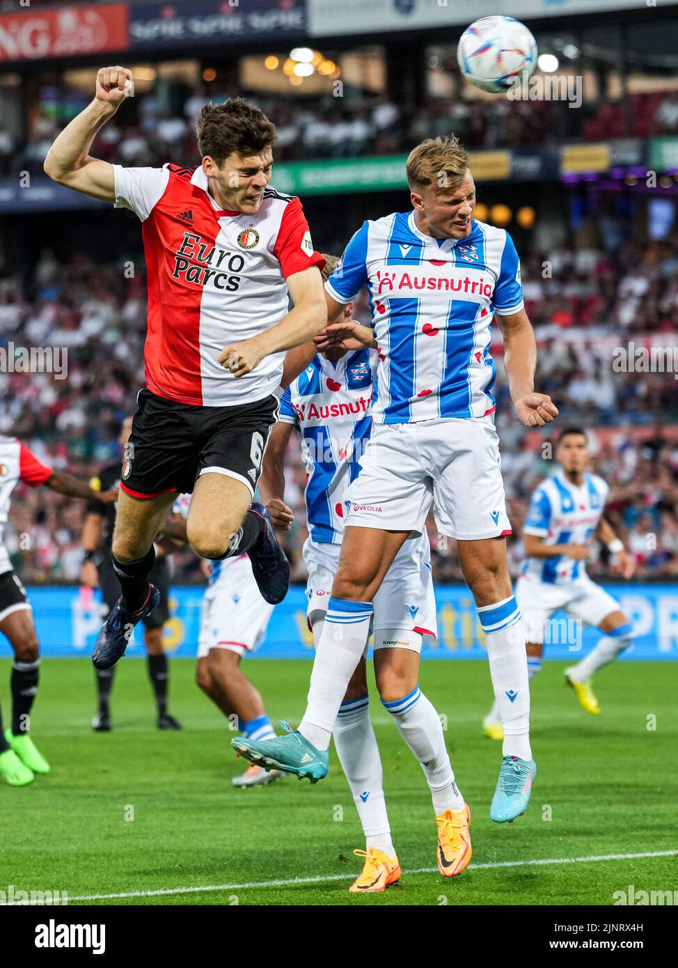 Rotterdam - Jacob Rasmussen of Feyenoord, Sydney van Hooijdonk of SC ...