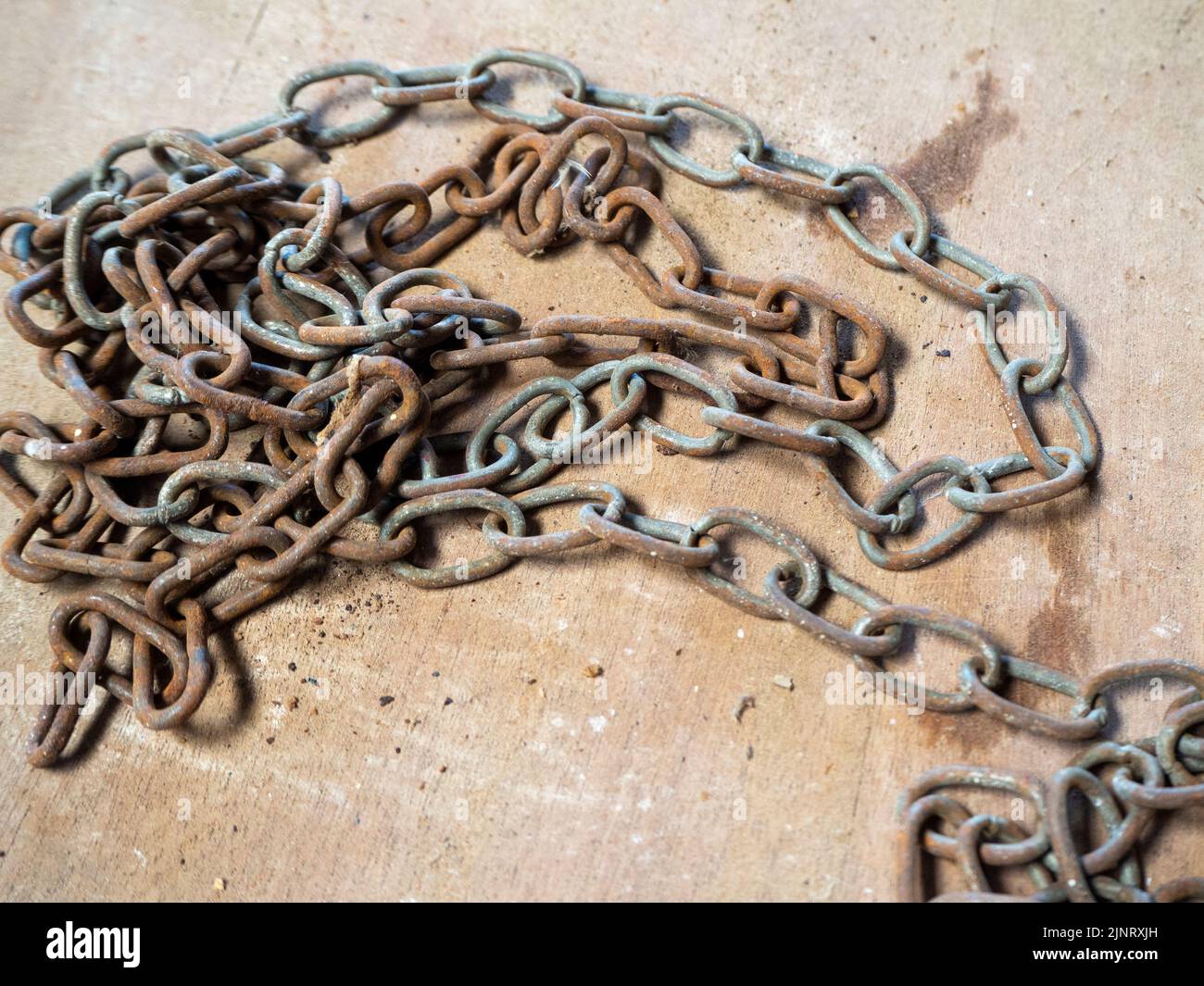 old rusted steel chains. Concept of antiquity and false security Stock ...