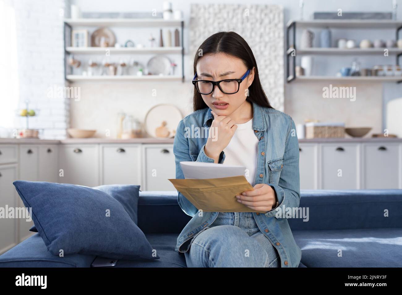 Young beautiful asian female student received bad letter from ...