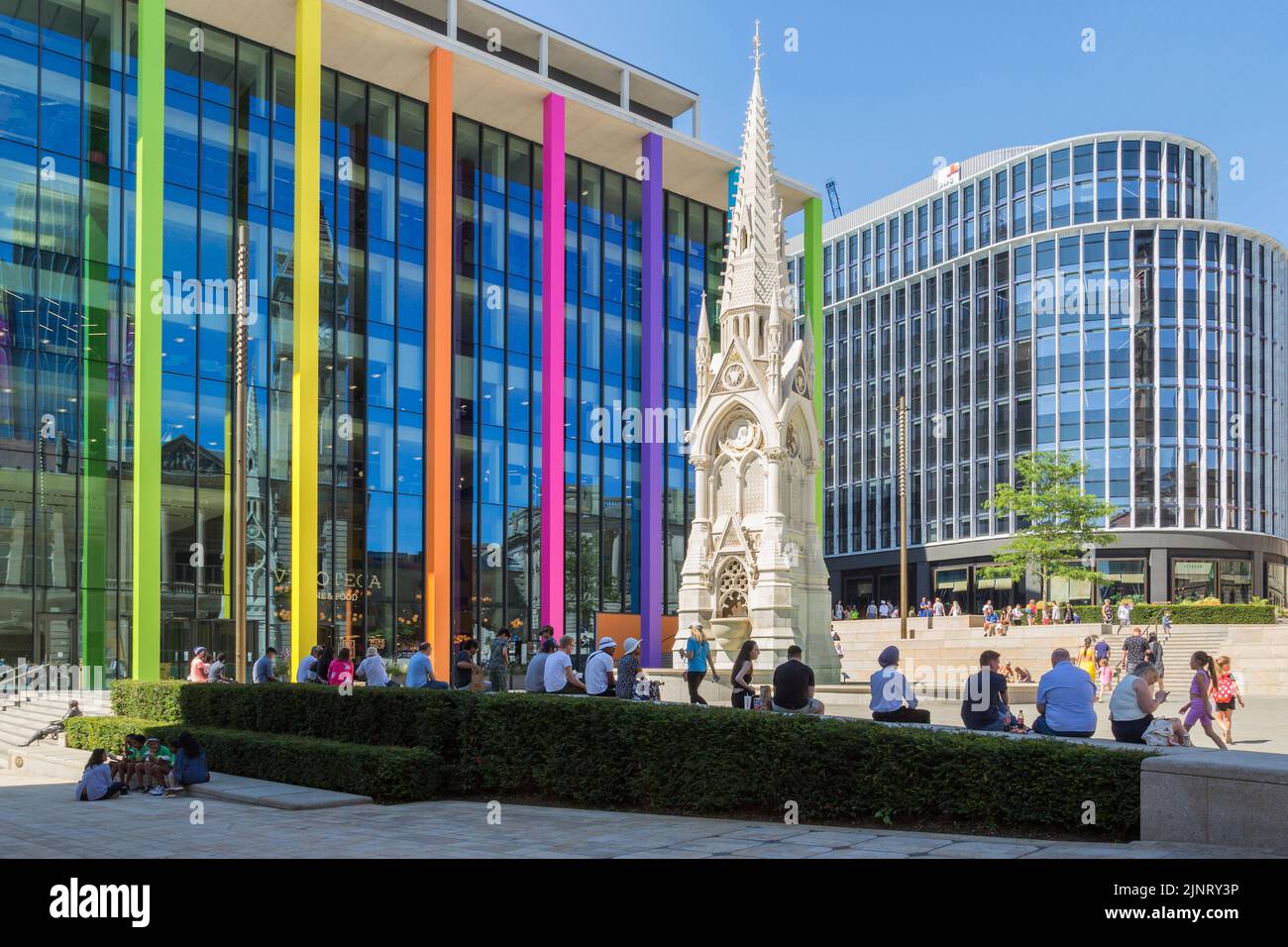 People take a rest and watch the world go by in Chamberlain Square. The ...