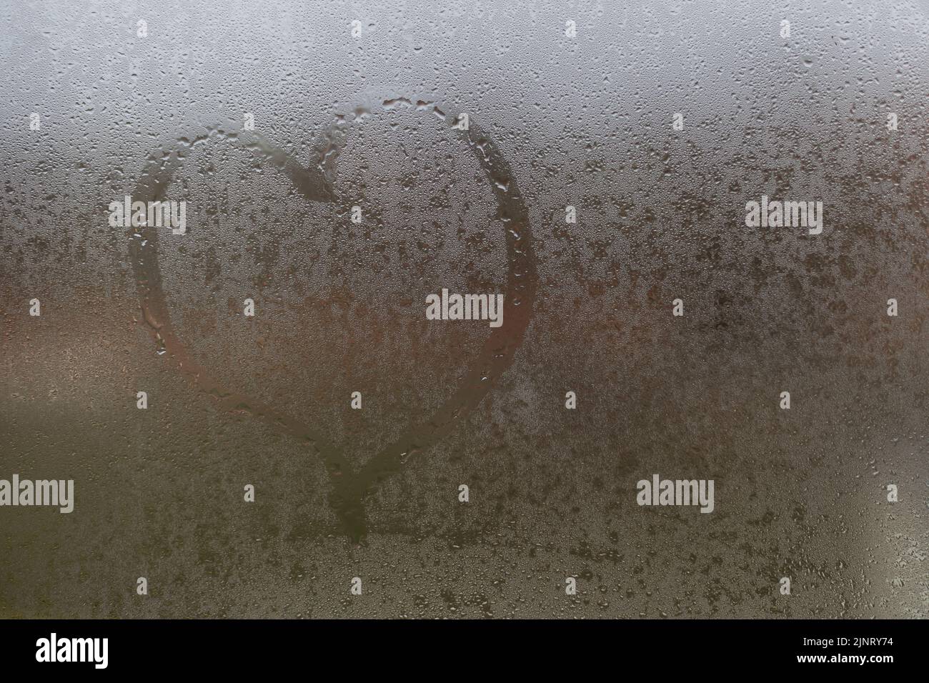 Heart on the Glass. heart on a foggy window Stock Photo - Alamy