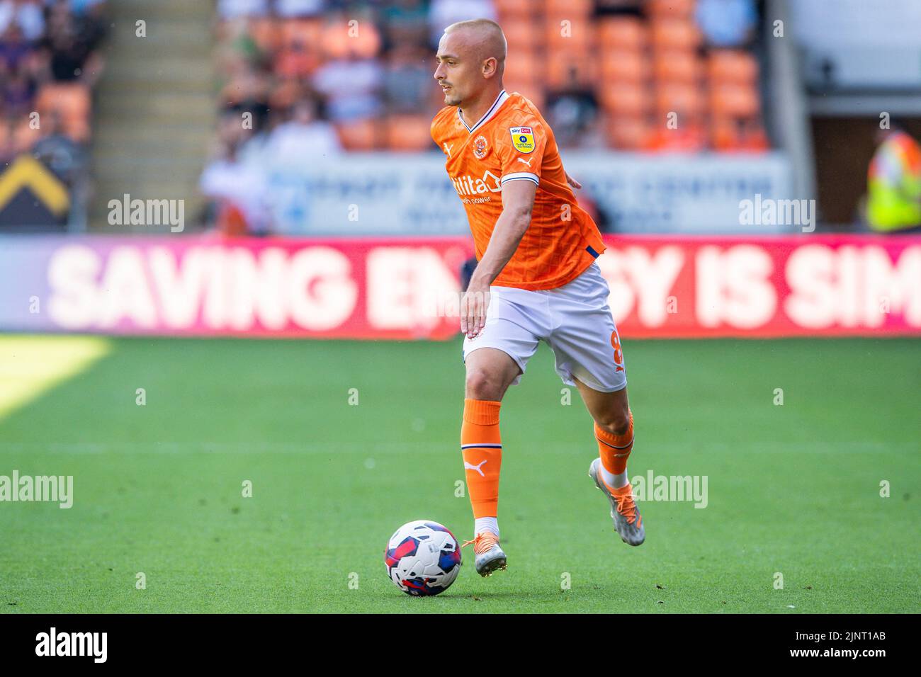 Lewis Fiorini #8 of Blackpool makes a break with the ball Stock Photo ...