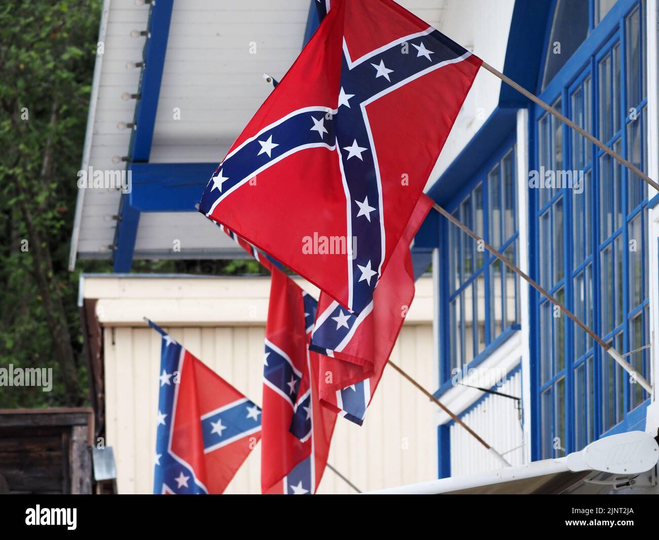 Flags of the Southern Confederate States under the roof of the building ...