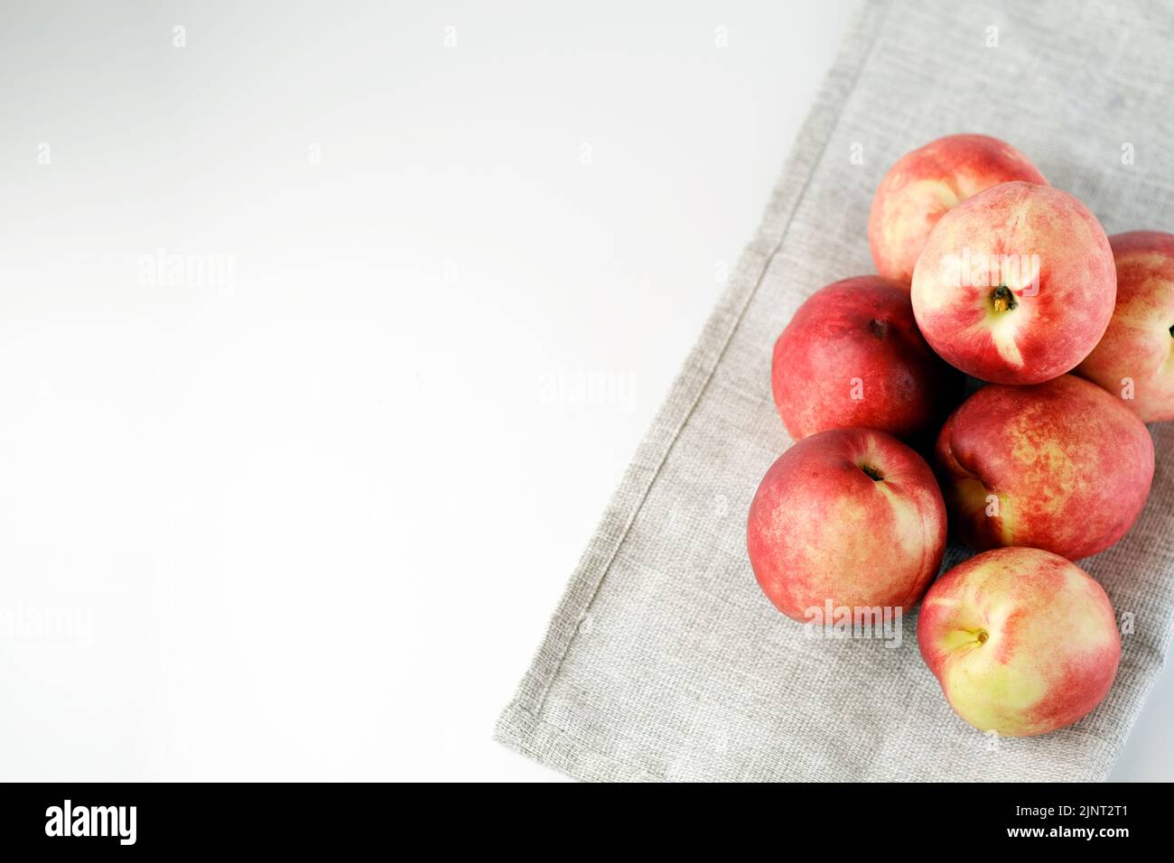Apple nectarine - Nectarine crossed with apple, on a white table Stock ...