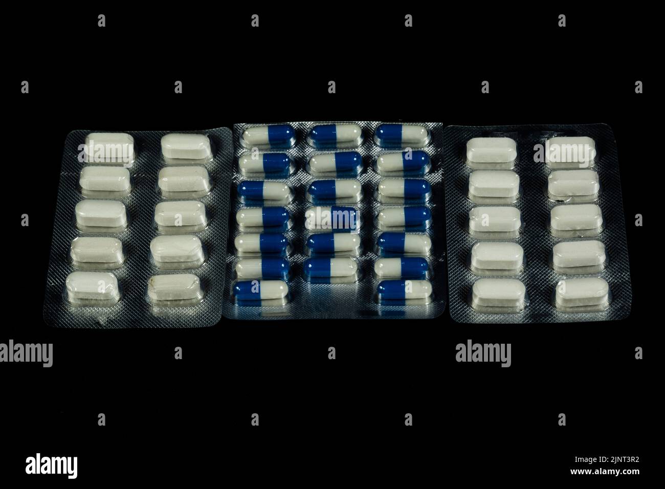 Pill pack for various diseases on a black background Stock Photo - Alamy