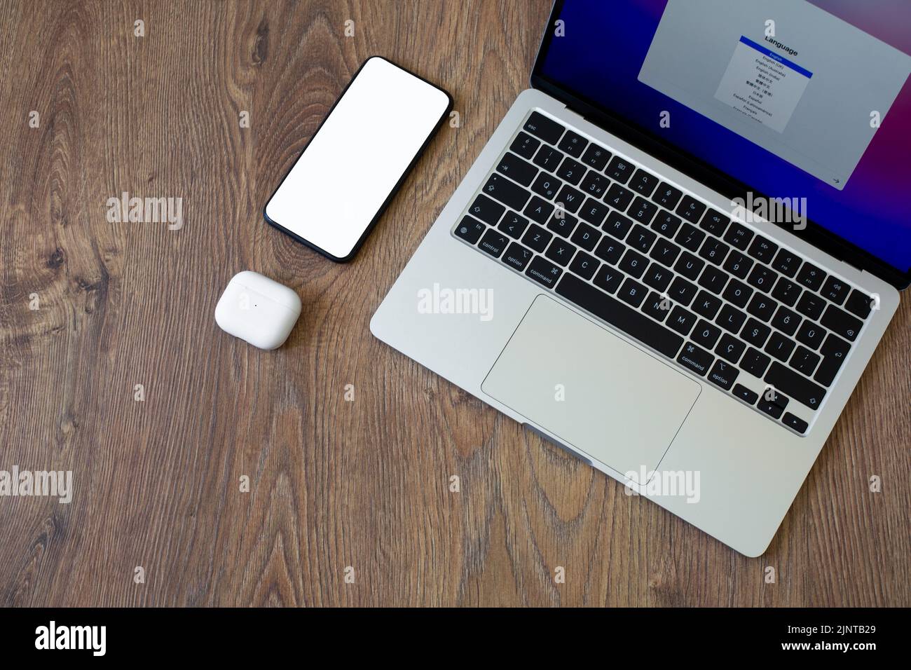 Computer splash screen and blank phone screen Stock Photo - Alamy