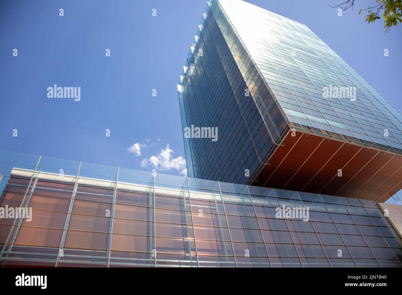 Modern building glass facade against blue sky. Company office in city ...
